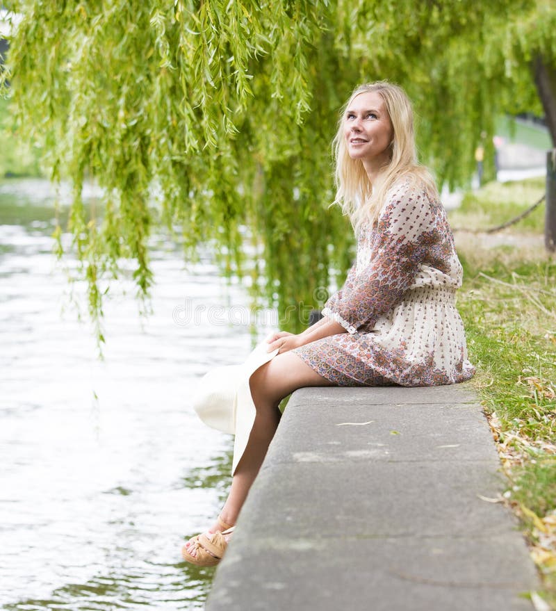 Woman by the river stock image. Image of leisure, spring - 43040821