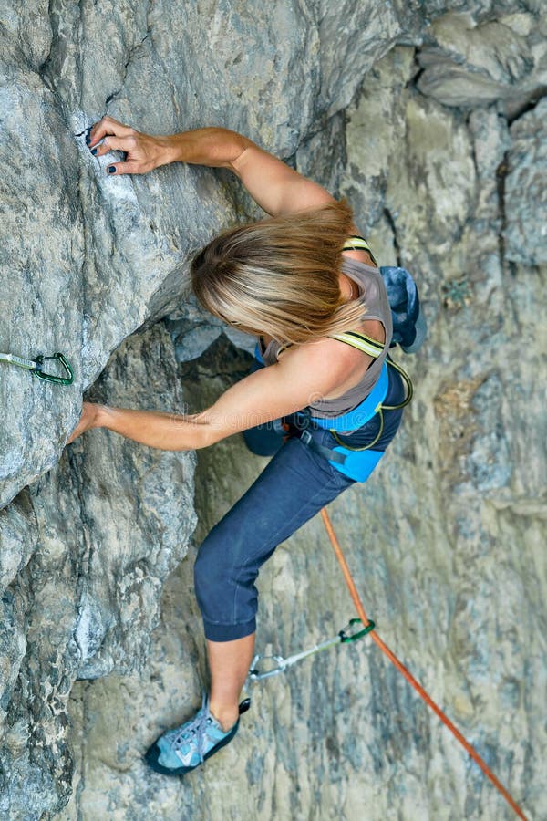 Woman Rock Climber Climbs on the Cliff Stock Photo - Image of physique ...