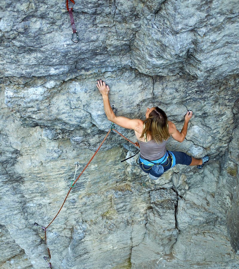 Woman Rock Climber Climbs on the Cliff Stock Photo - Image of cliff ...