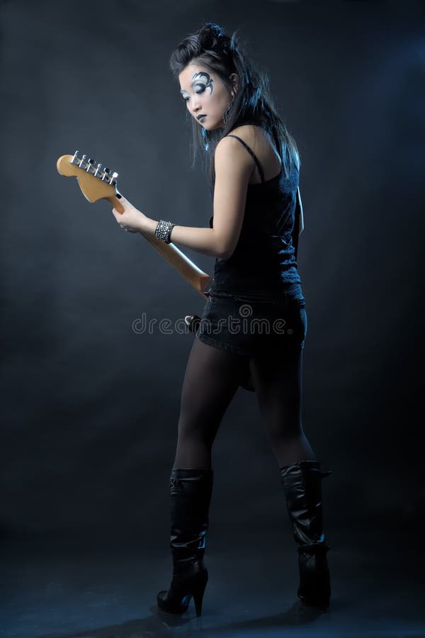 Rock girl shaking her head stock photo. Image of body - 5130360