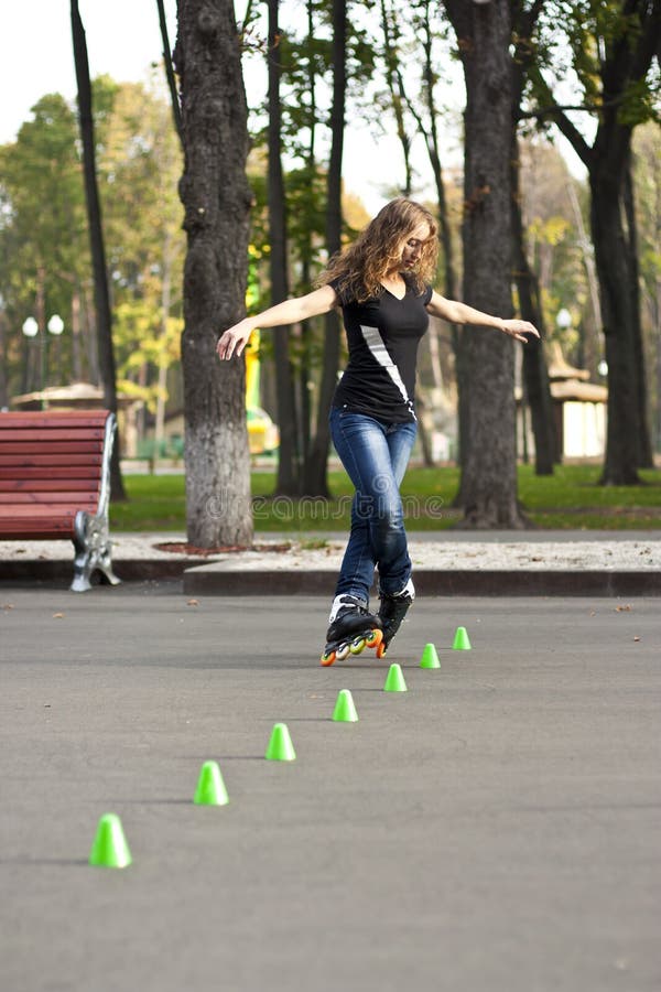 Woman Rollerblading in the Park in Spring Stock Photo - Image of people ...