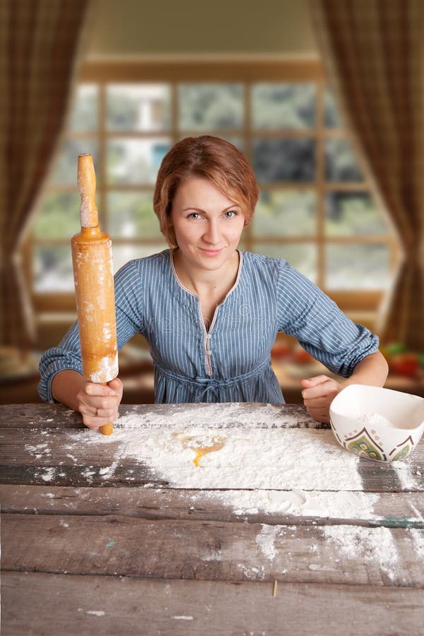 Woman with Rolling-pin in the Kitchen, Bright Emotional Portrait Stock ...
