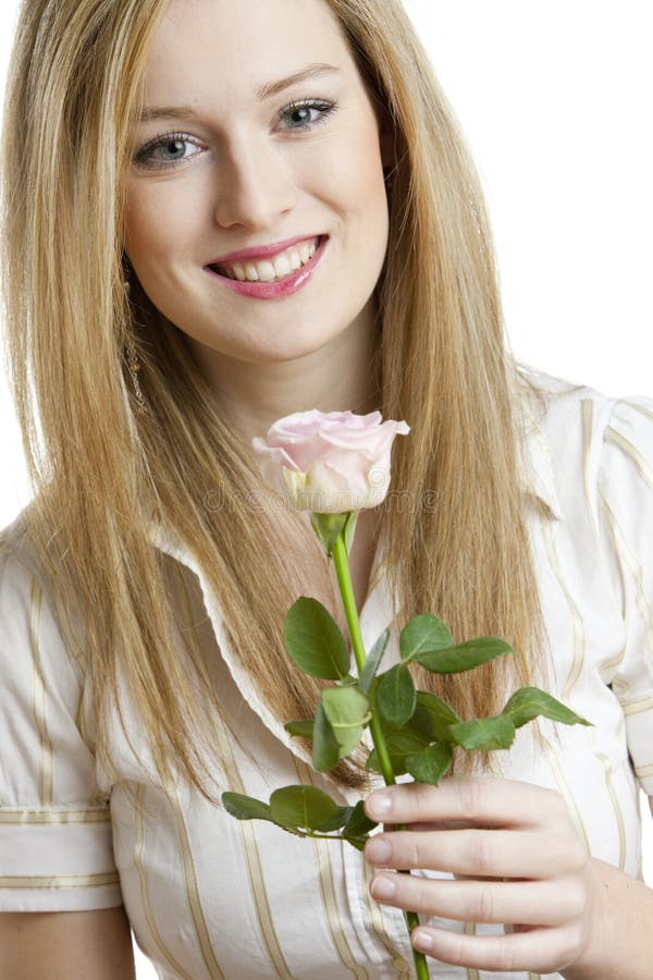 Woman with a rose stock image. Image of flower, interior - 12175617
