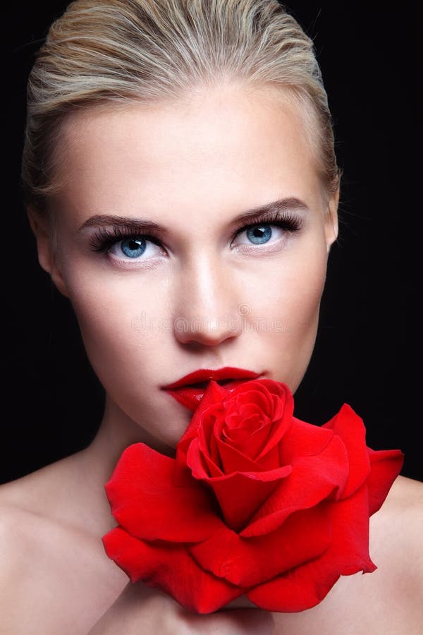 Woman with rose stock photo. Image of allure, female - 21431672