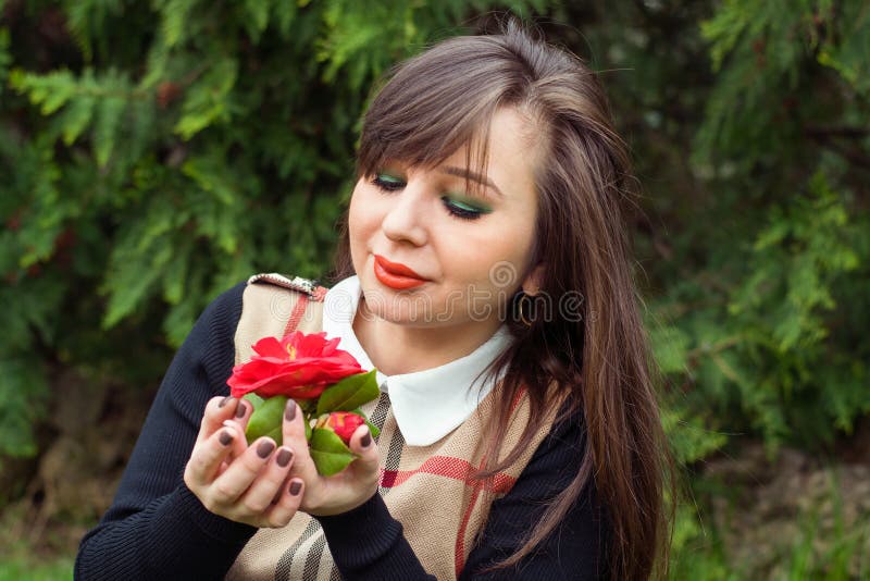 Woman and rose stock image. Image of hand, sensual, tree - 70705285