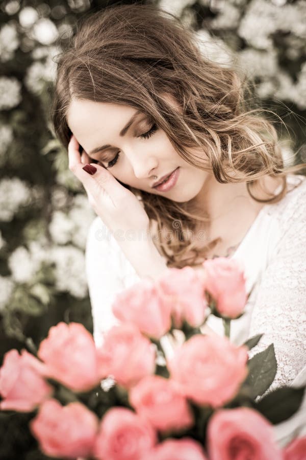 Woman with roses stock photo. Image of summer, bouquet - 86471098