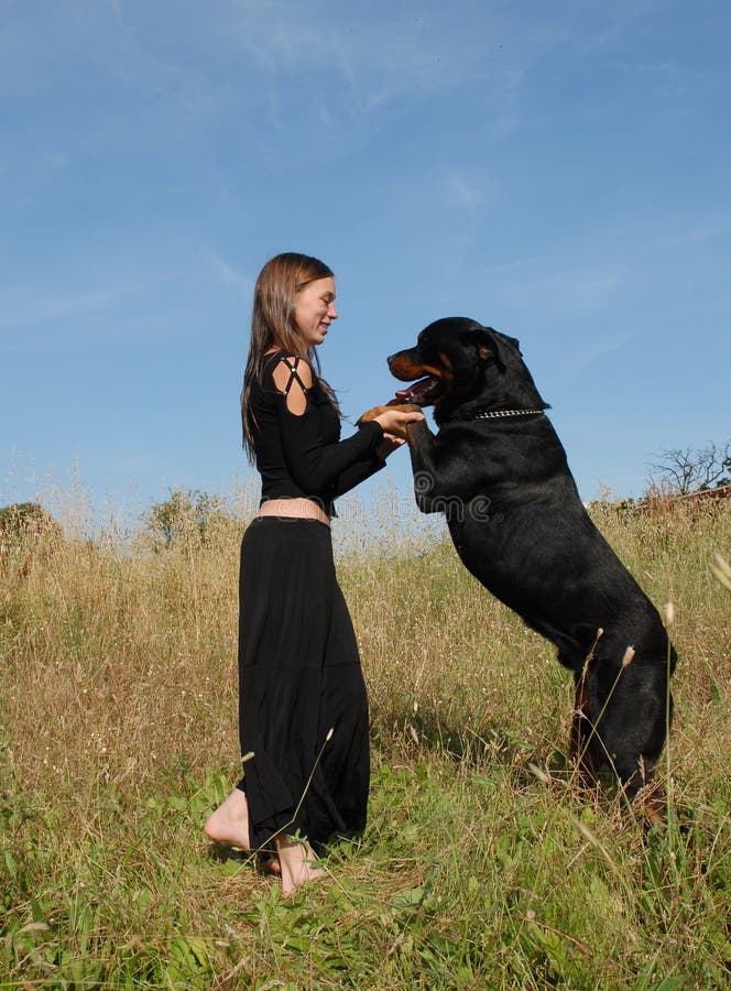Woman and rottweiler stock photo. Image of slim, teen - 3346684