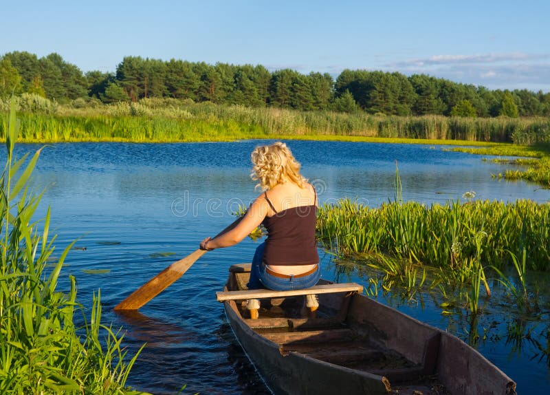 Woman rowing on river stock photo. Image of countryside - 32894358