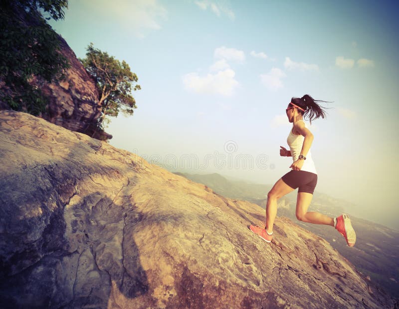 Woman Runner Running on Mountain Peak Stock Photo - Image of back ...