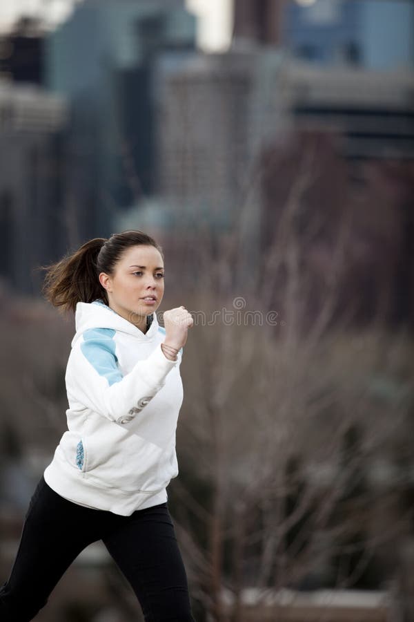 Woman Running stock image. Image of determined, teal - 13951141