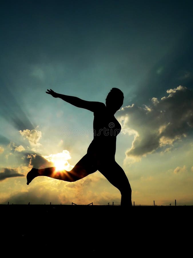 Yoga at Sunrise stock photo. Image of moving, dancing - 12674732