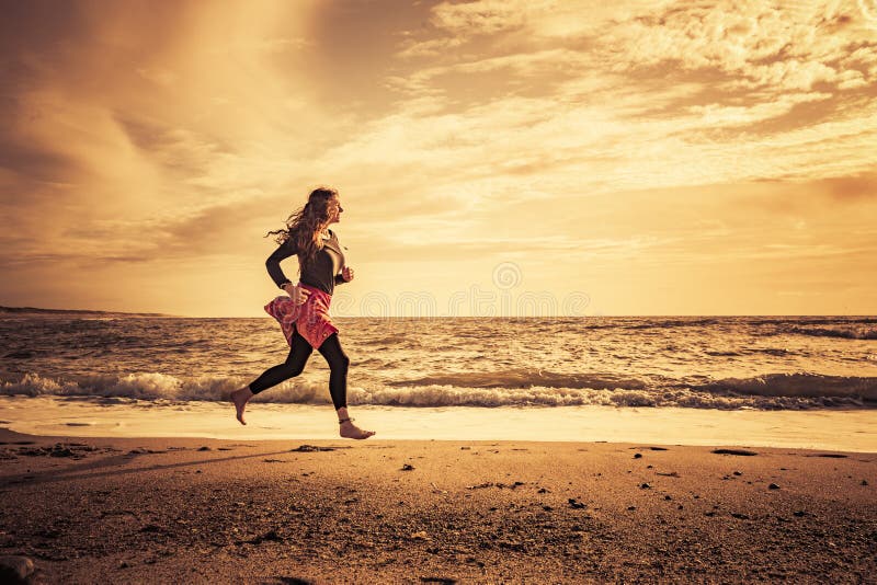Woman Doing Beach Run on the Beach at Sunset Stock Image - Image of ...