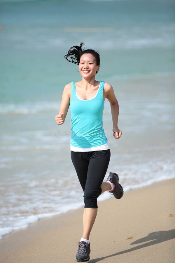 Woman running beach stock image. Image of activity, person - 34051207