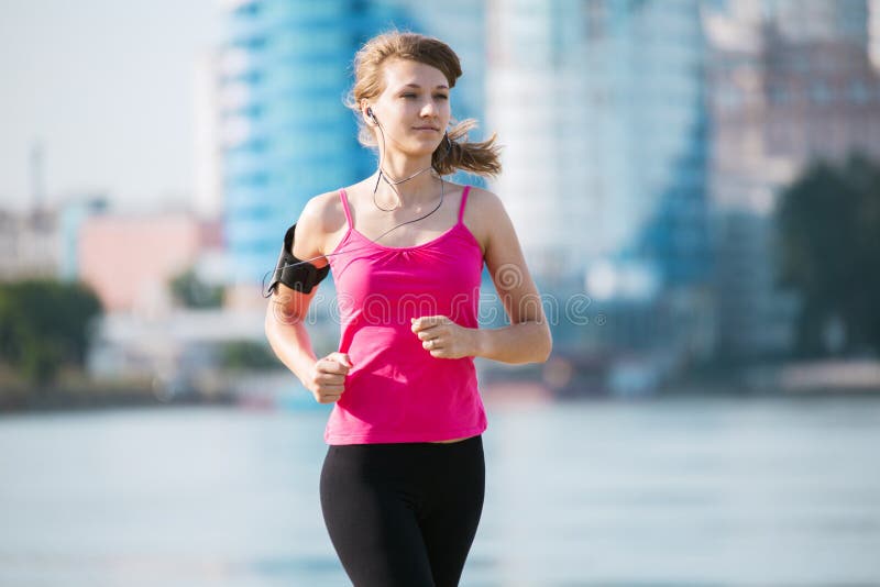 Woman running in the city stock image. Image of legs - 77038151