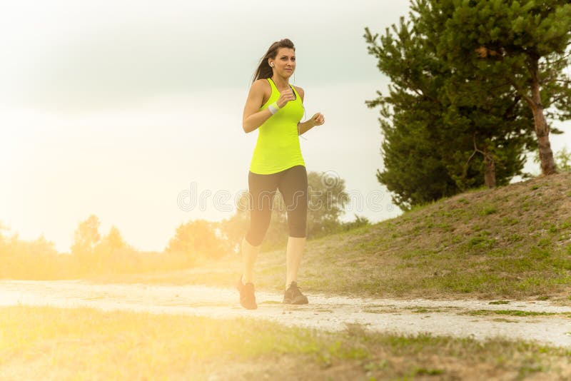 Woman Running In Countryside Stock Photo - Image of running, jogging ...