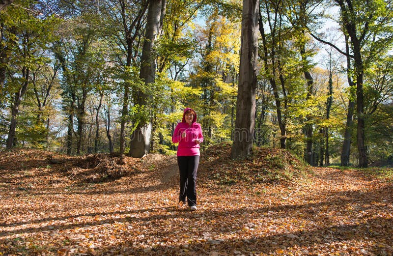 Woman Running in the Forest Stock Image - Image of human, healthy: 36574337