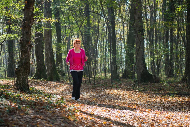 Woman Running in the Forest Stock Photo - Image of color, stamina: 36574484