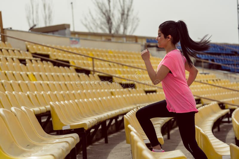 Woman running in ground stock image. Image of caucasian - 146082521