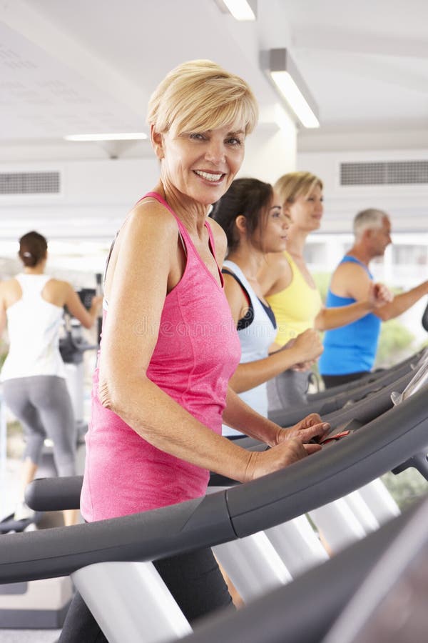 Woman on Running Machine in Gym Stock Image - Image of female, indoors ...