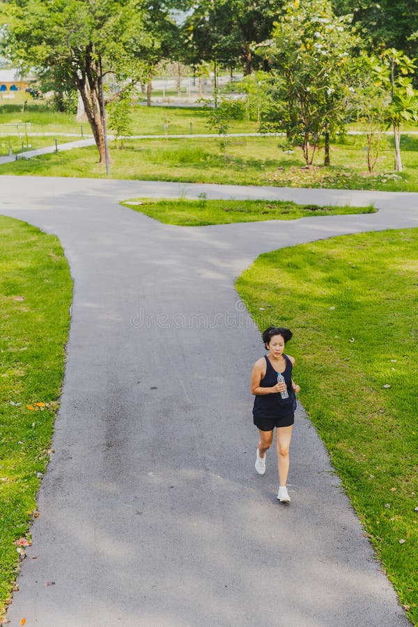 Woman Running in the Park at Morning. Stock Photo - Image of outside ...