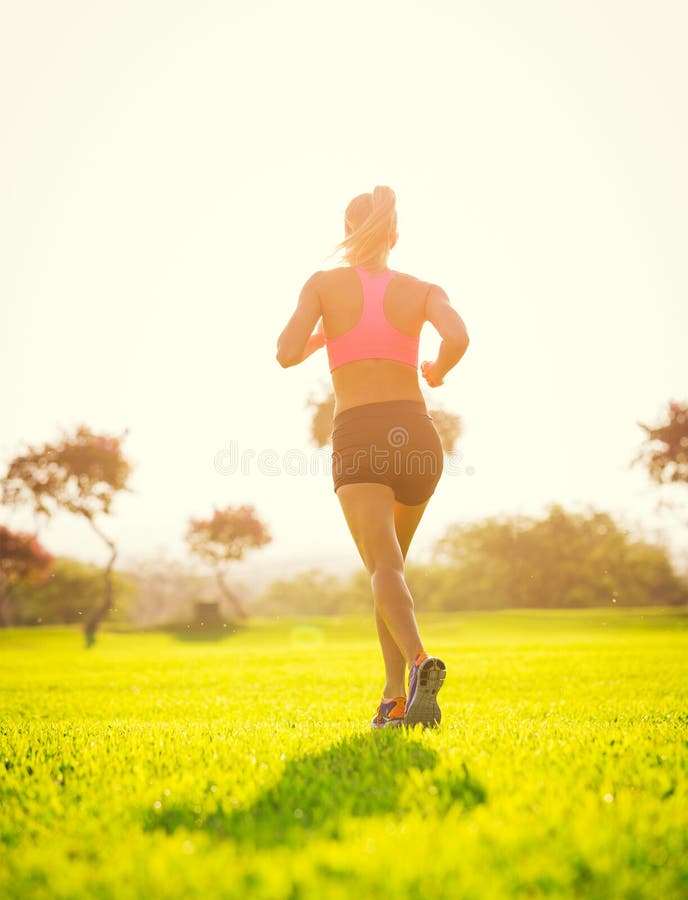 Woman running in summer stock photo. Image of fitness - 2237612
