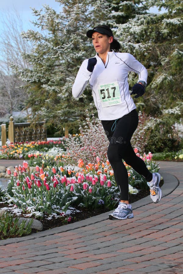 Woman running in race editorial stock photo. Image of female - 19733088