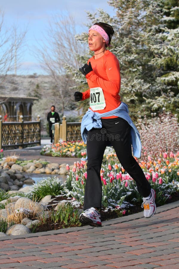 Woman running in race editorial stock image. Image of fast - 19733094