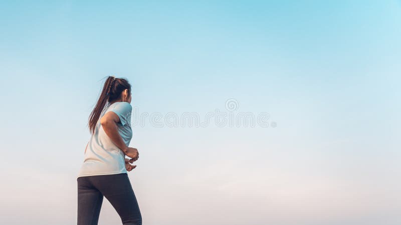 Woman Running on Road with Blue Sky Background Stock Image - Image of ...