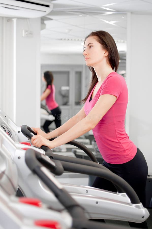 Woman on a Running Simulator Stock Image - Image of thin, figure: 12918761