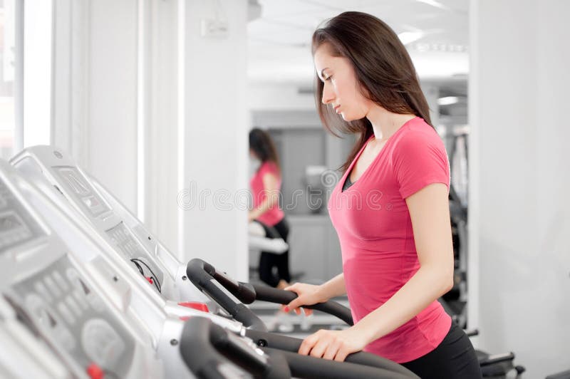 Woman on a Running Simulator Stock Photo - Image of health, sport: 12958520