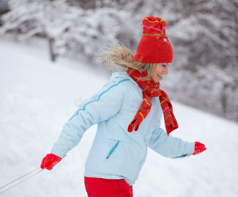 Woman Running through the Snow Stock Photo - Image of color, confidence ...