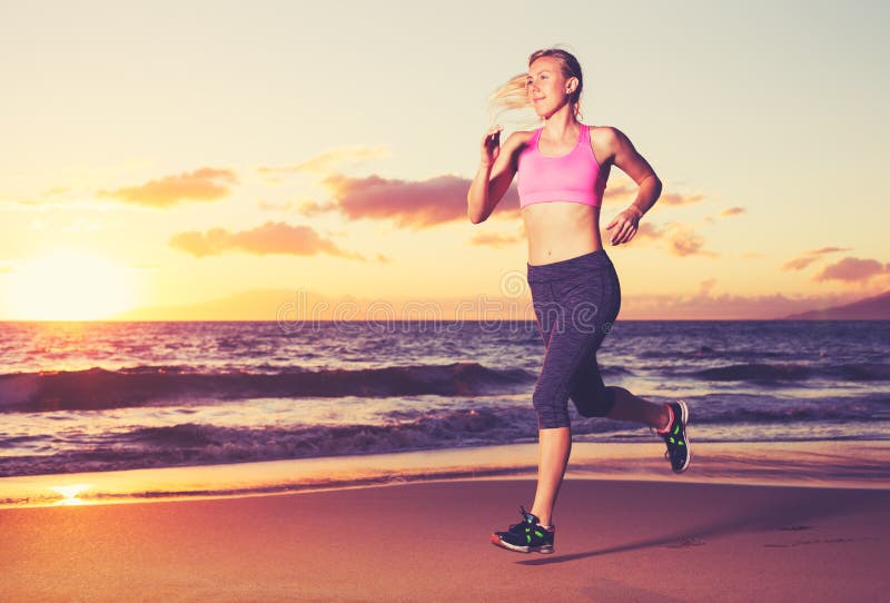 Woman Running at Sunset stock photo. Image of fitness - 56924984