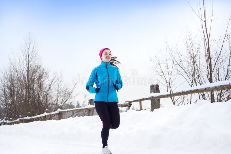 Woman running in winter stock image. Image of foot, recreation - 28939459