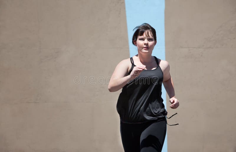 Woman Runs To Keep in Shape Stock Image - Image of race, exercise: 15584499