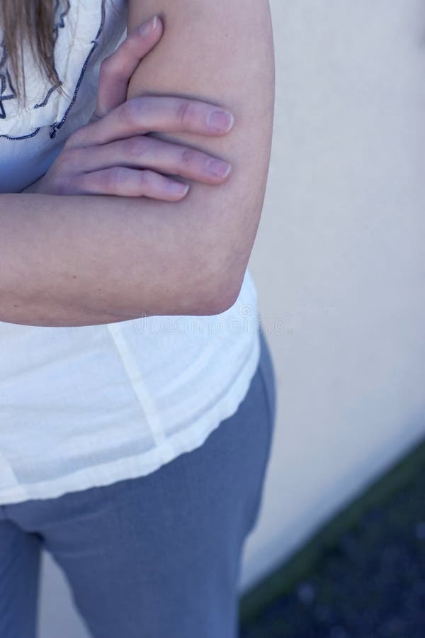 Woman s Arms Folded stock photo. Image of closeup, firm - 2383764