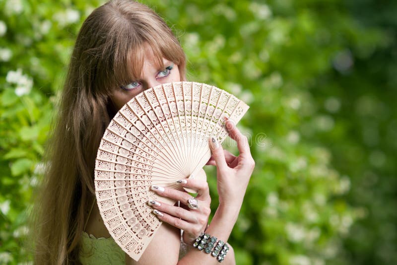 Woman s face and fan stock photo. Image of hair, rest - 25305242