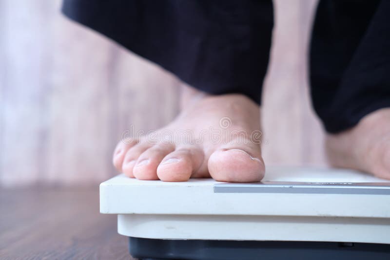 Woman`s Feet on Weight Scale Close Up. Stock Image - Image of measure ...