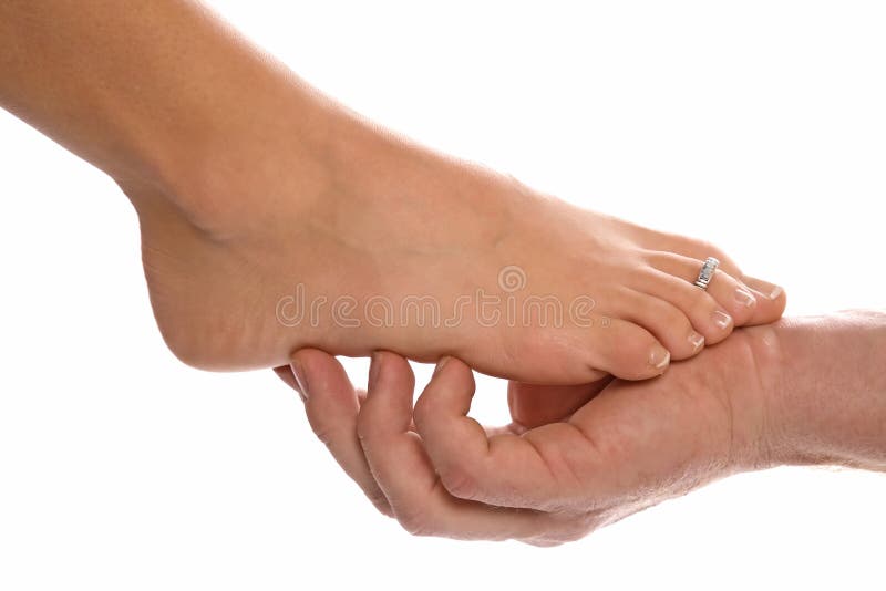 Woman s foot and mans hand stock photo. Image of lifestyle - 11743260