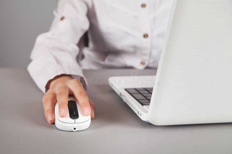 Woman`s Hand with Computer Mouse on Table. White Computer Stock Image ...