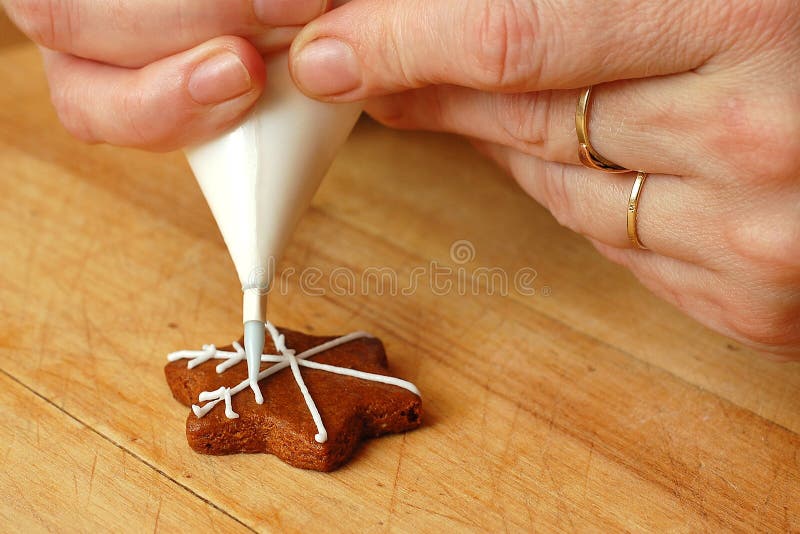 Woman S Hand Decorating Christmas Sweets Stock Image - Image of ...