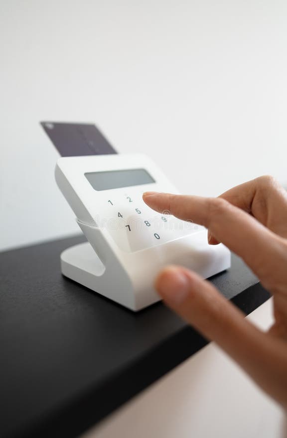 Woman S Hand Entering a PIN Code on a Payment Terminal Stock Photo ...