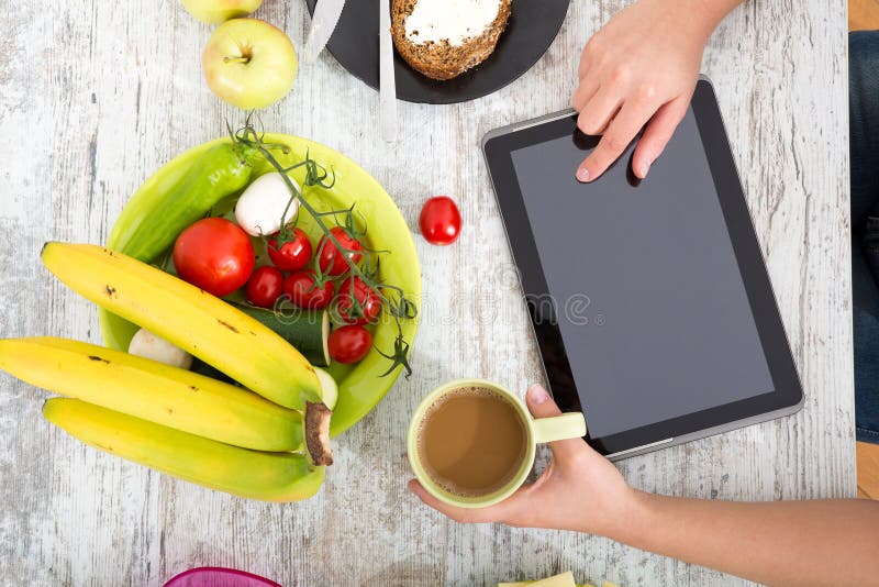 A Woman`s Hand with Food and Tablet Stock Photo - Image of gourmet ...