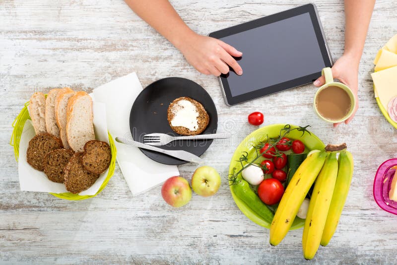 A Woman`s Hand with Food and Tablet Stock Image - Image of closeup ...