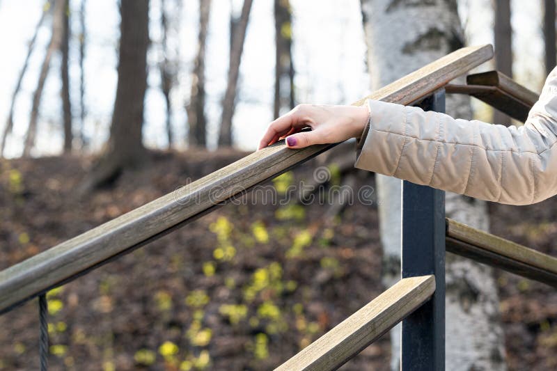 Woman& X27;s Hand Holding the Handrail of the Stairs in the Park Stock ...