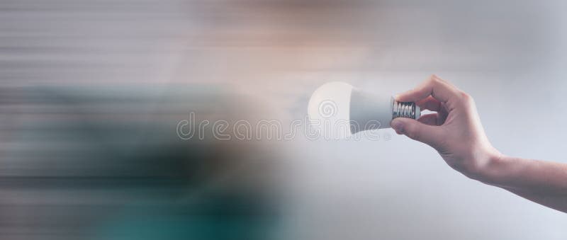 A Woman`s Hand Holding a Light Bulb Stock Image - Image of concept ...