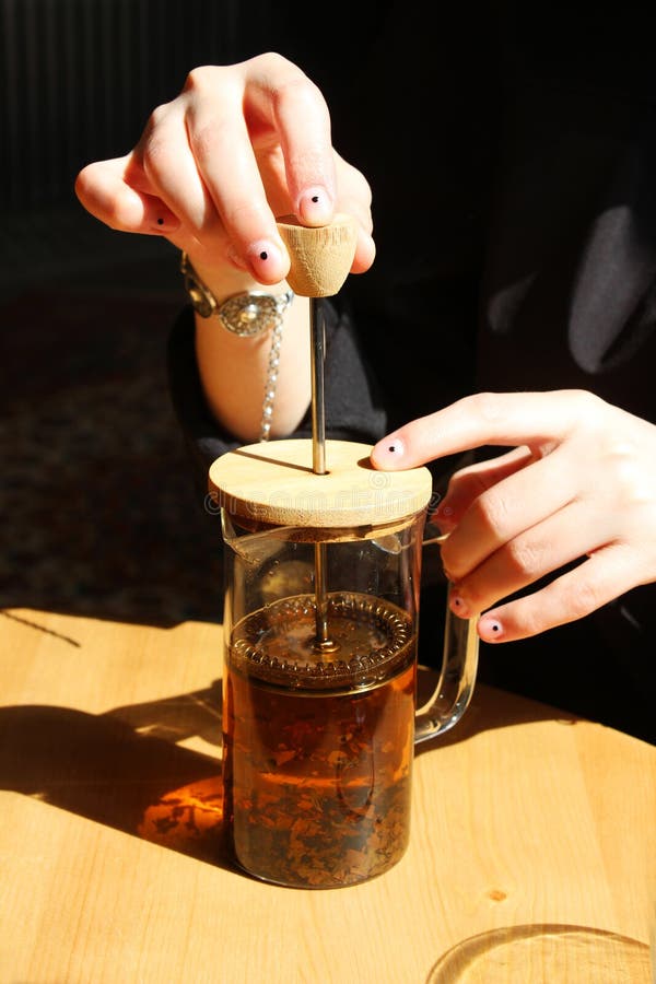 Woman`s Hand Holding Tea Kettle Stock Image - Image of drinkin, closeup ...