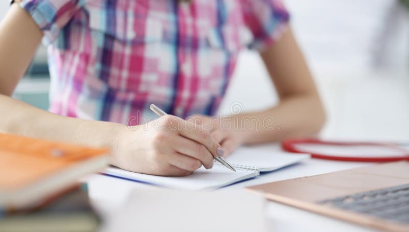 Woman Hand Makes Notes with Pen in Notebook Stock Photo - Image of ...