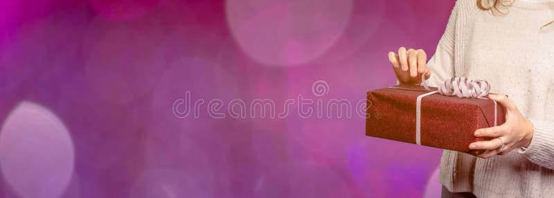 Woman`s Hand Opens the Loop on Her Present Stock Photo - Image of ...