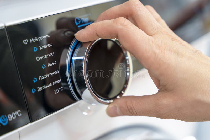 Woman& X27;s Hand Selects the Washing Mode with a Round Selector Stock ...