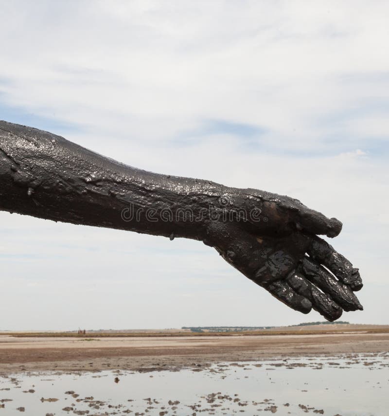 Woman`s Hand Smeared with Black Healing Mud Stock Photo - Image of ...